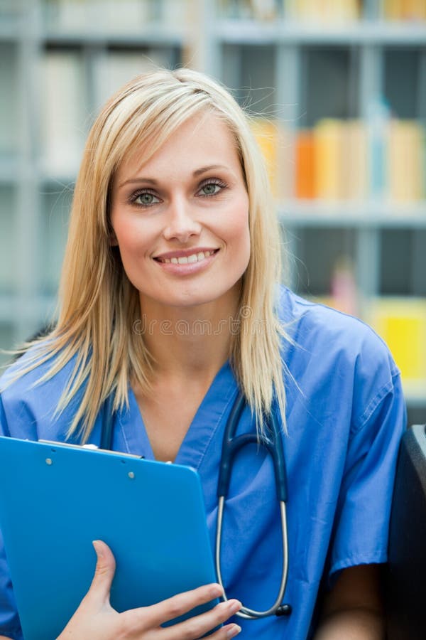Blond Doctor Wearing Gloves Stock Image - Image of calm, doctor: 12112315