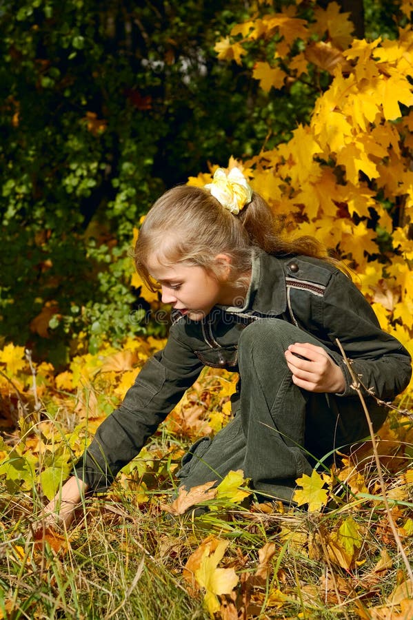 Young Blond Girl in an Autumn Stock Image - Image of grass, autumn: 3433371