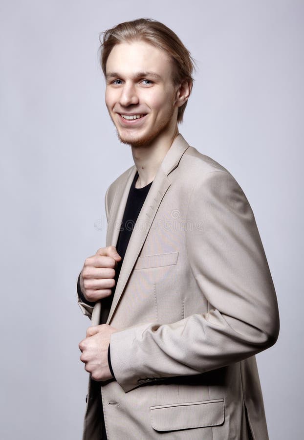 Young Blond Male Model in Beige Man Suit Stock Photo - Image of beige ...
