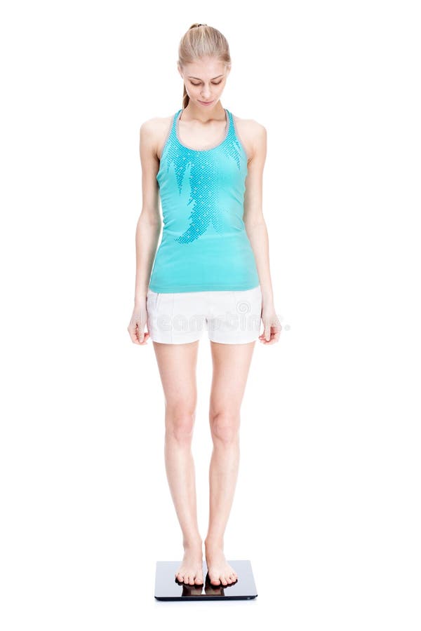 Young Blond Woman Standing on Scales Stock Image - Image of person ...