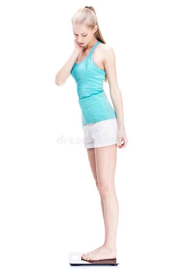 Young Blond Woman Standing on Scales Stock Image - Image of adult ...