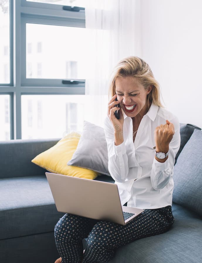 Young Blonde Screaming with Joy while Talking on Phone Stock Image ...
