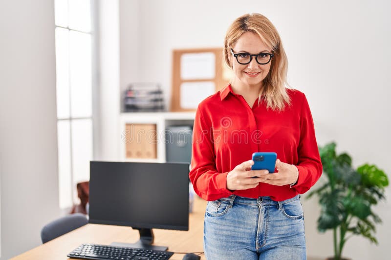 Young Blonde Woman Business Worker Smiling Confident Using Smartphone ... Young Blonde Woman Business Worker Smiling Confident Using Smartphone ...