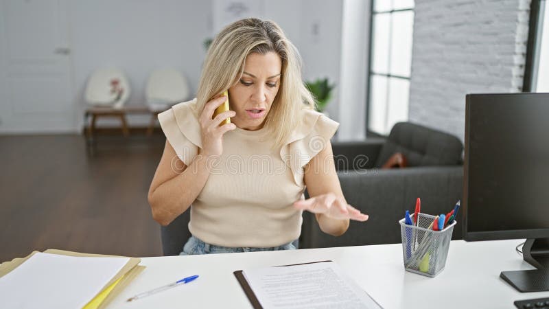 Young Blonde Woman Business Worker Talking on Smartphone Reading ... Young Blonde Woman Business Worker Talking on Smartphone Reading ...