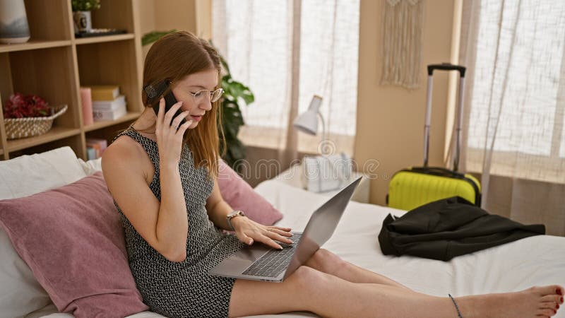 Young Blonde Woman Business Worker Talking on Smartphone Using Laptop ... Young Blonde Woman Business Worker Talking on Smartphone Using Laptop ...