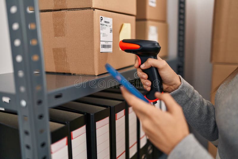 Young Blonde Woman Ecommerce Business Worker Scanning Packages Using ...