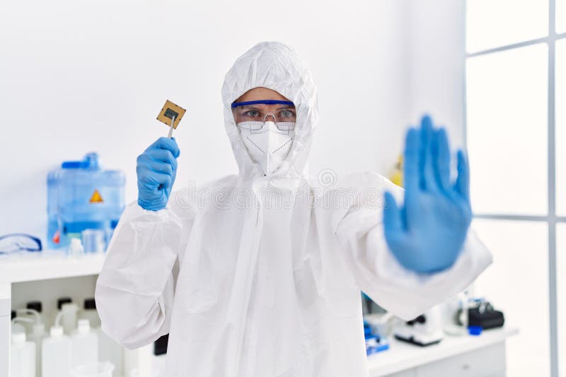Young Blonde Woman Holding Cpu Computer Processor at Laboratory with ...
