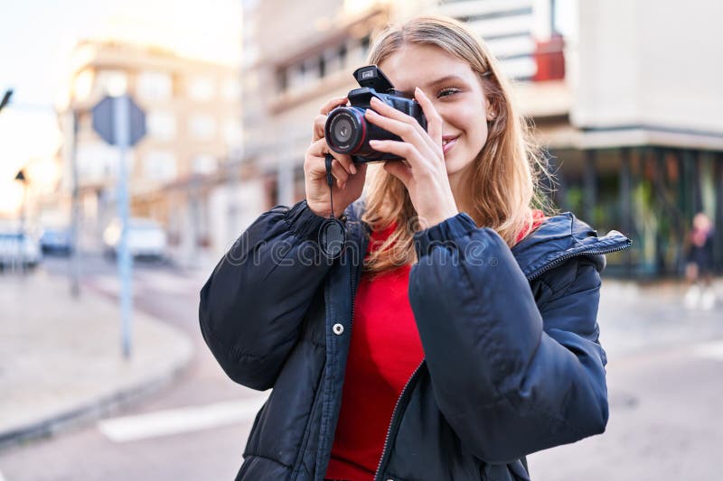 Young Blonde Woman Smiling Confident Using Professional Camera at ...