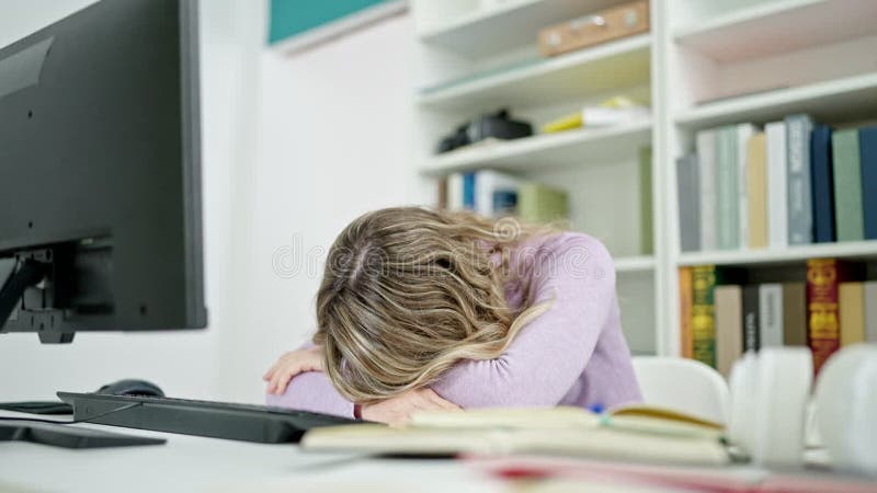 Young Blonde Woman Student Stressed Using Computer at Classroom Stock ...