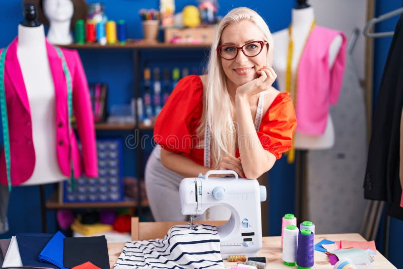 Young Blonde Woman Tailor Smiling Confident Leaning on Sewing Machine ...