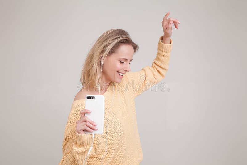 Young Blonde Woman Wearing Yellow Sweater Recalling Nice Memories As ... Young Blonde Woman Wearing Yellow Sweater Recalling Nice Memories As ...