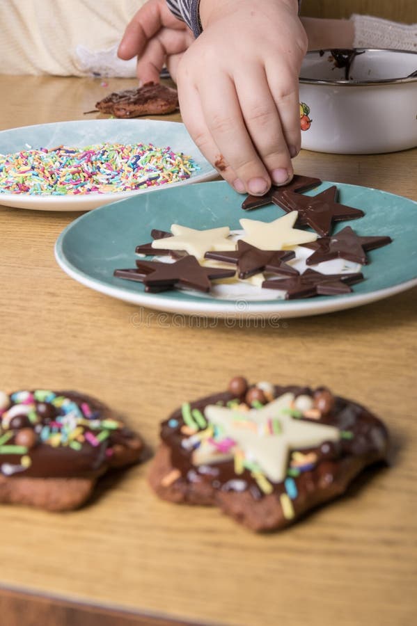 Young Bo Decorating Cookies Stock Image - Image of helping, cook: 70826271