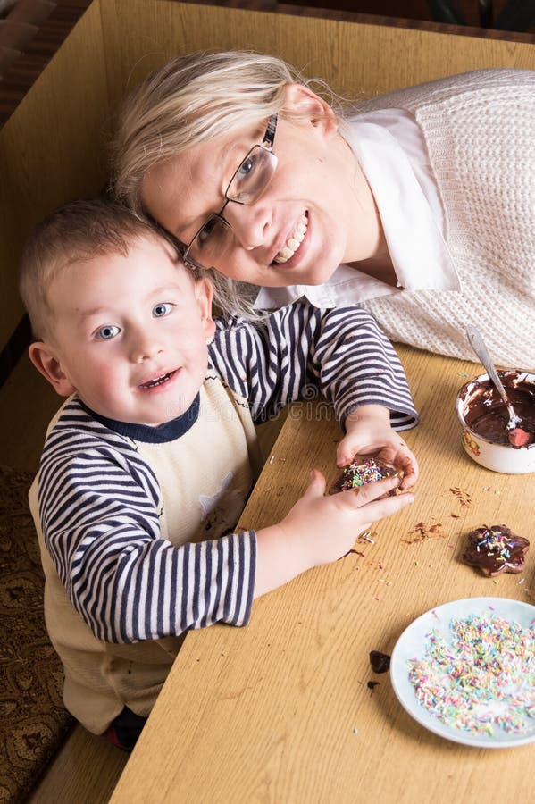 Young Bo Decorating Cookies Stock Image - Image of homemade, cooking ...