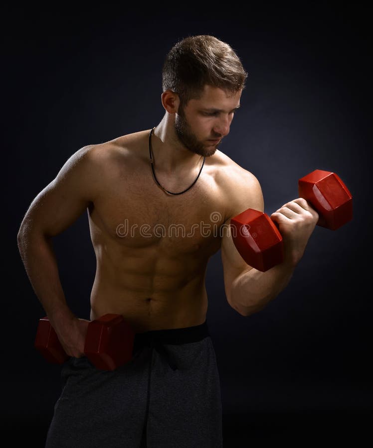 Young Bodybuilder on a Black Background Stock Image - Image of health ...