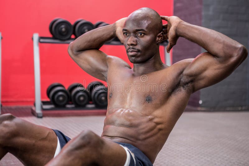 Young Bodybuilder Doing Excercises Stock Photo - Image of excercises ...