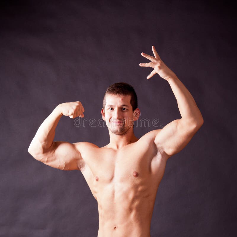 Young bodybuilder posing stock photo. Image of fitness - 28781936