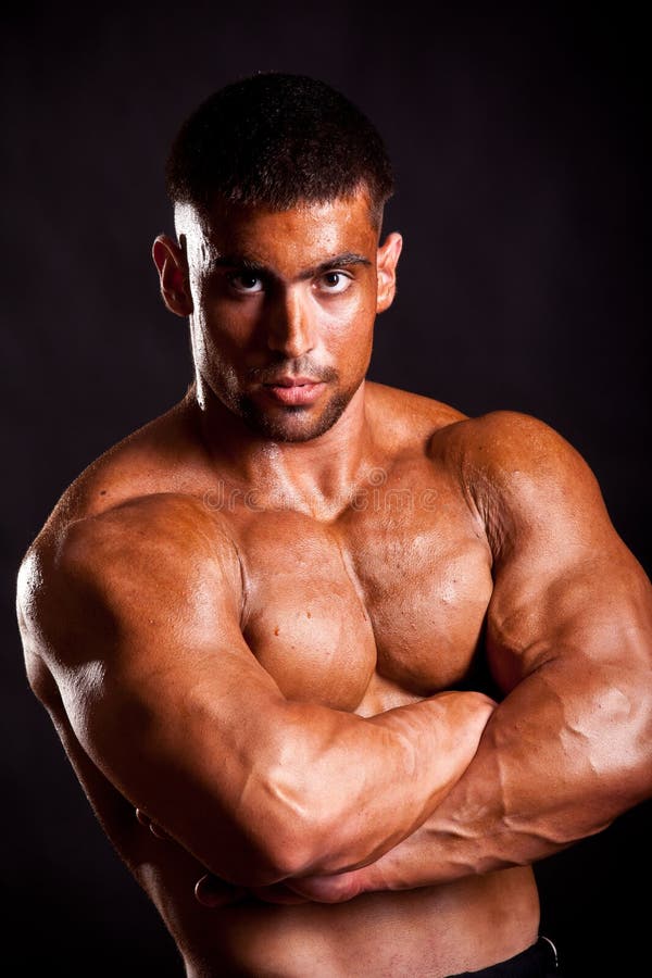 Young bodybuilder posing stock image. Image of muscle - 33624601