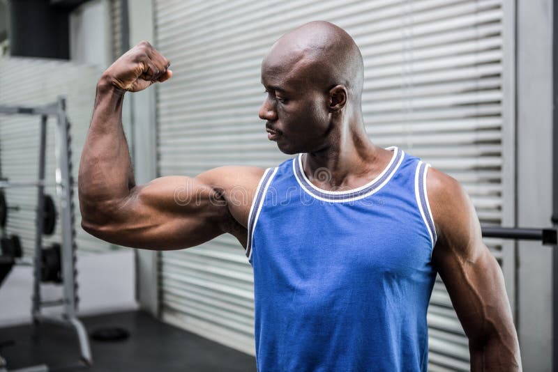 Young Bodybuilder in Shirt Looking at the Camera Stock Photo - Image of ...