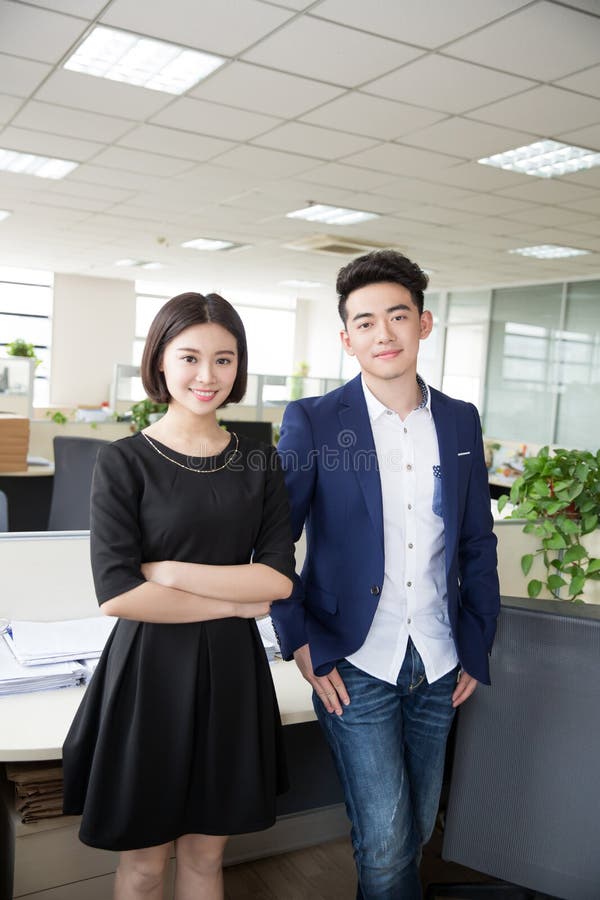 Young Boss and Assistant at Work Stock Photo - Image of laugh, arms ...