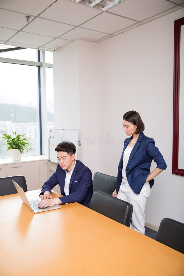 Young Boss and Assistant at Work Stock Image - Image of blackboard ...