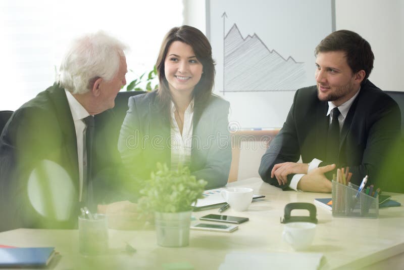 Young boss with employees stock image. Image of business - 52709963