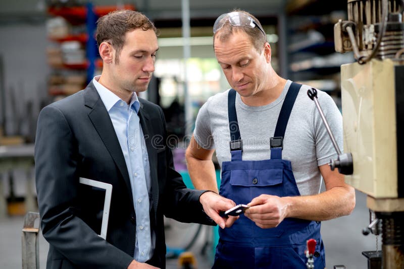 Boss and Worker in Conversation Stock Photo - Image of industry ...