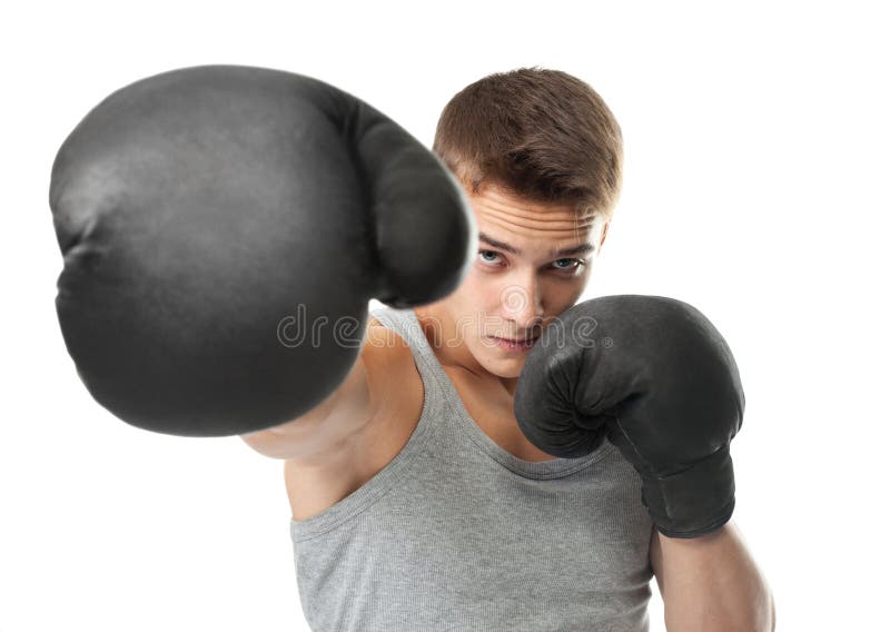 Young Boxer Throwing Punch at Camera Stock Photo - Image of aggression ...