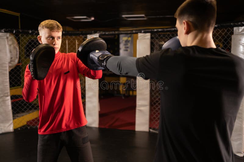 Young Boxer Training with His Trainer during Trains Stock Image - Image ...