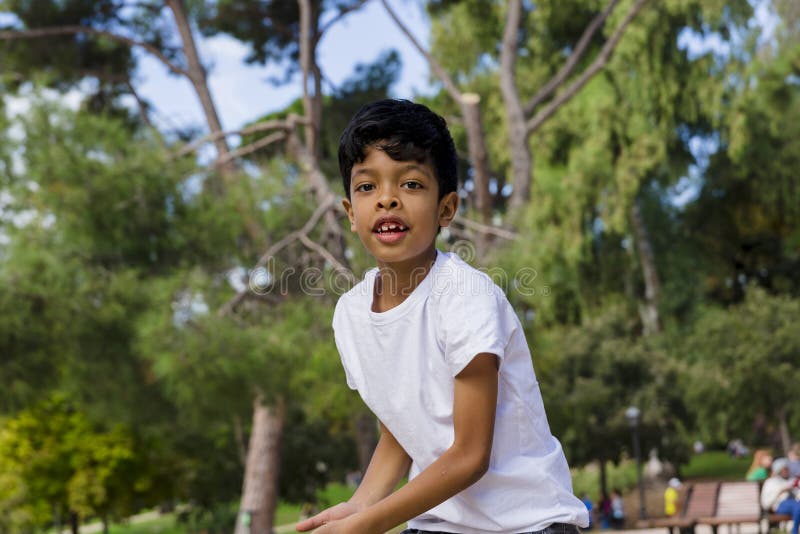 Young Boy Alone. Having Fun in a Park. Stock Image - Image of jump ...