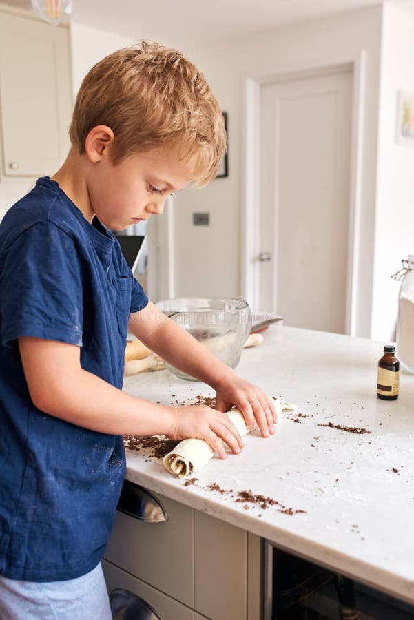 Young Boy Baking in Kitchen Stock Photo - Image of cookie, pastry ...