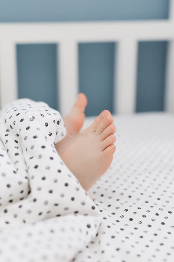 Child Bare Feet Bed Under Blanket Stock Image - Image of sheet, home ...