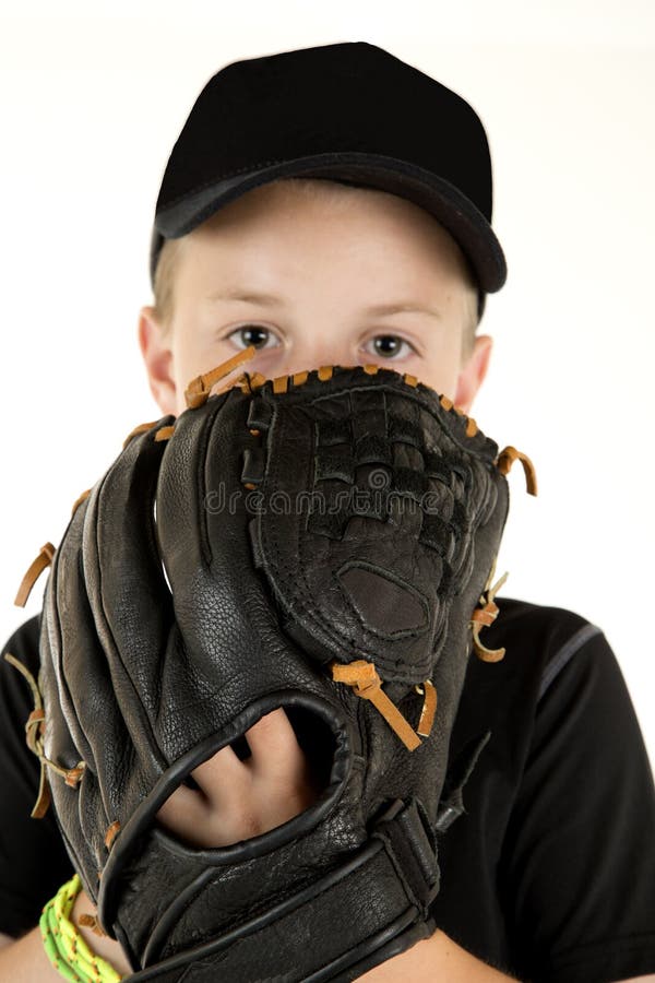 Young Boy Baseball Pitcher Peering Over Glove Ready To Pitch Stock ...