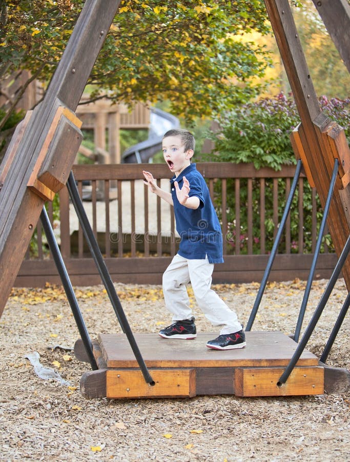 Young Boy Being Silly at the Park Stock Photo - Image of playground ...