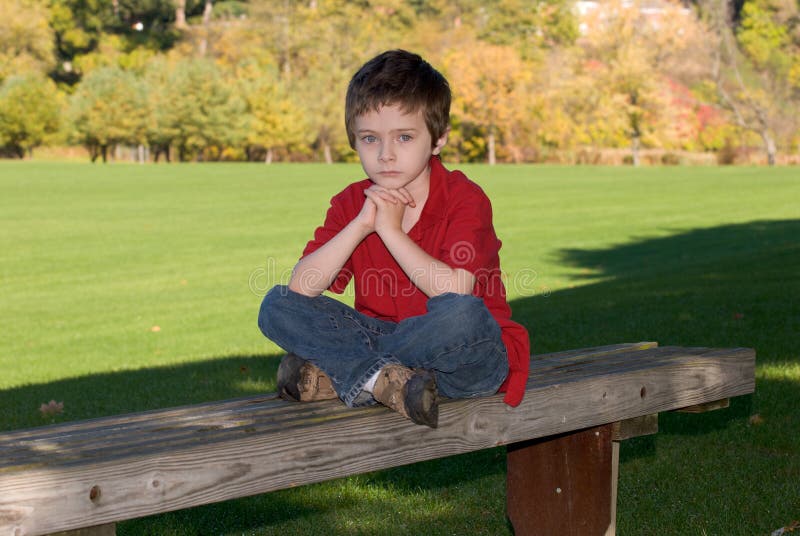 Young boy on bench stock image. Image of adorable, person - 3441635