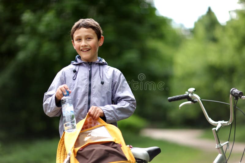 Young boy with bicycle stock image. Image of healthy - 25522427