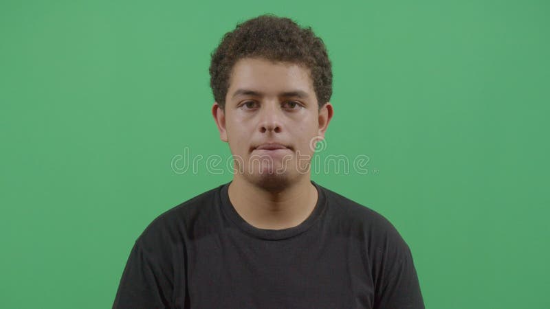 Young Boy Biting His Lower Lip Stock Footage - Video of isolated ...