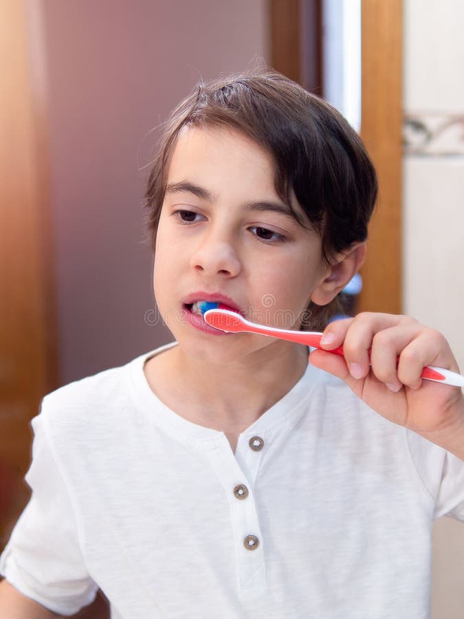 Young Boy Brushing Teeth in Bathroom Stock Image - Image of home ...