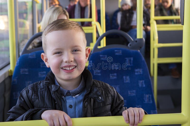 Young boy on the bus stock photo. Image of women, child - 58160938