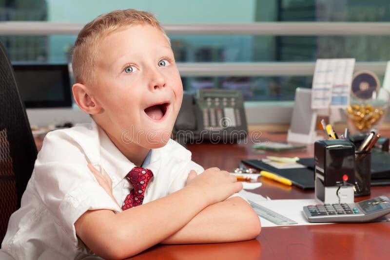 Young Boy in Business Office Stock Image - Image of mischievous, silly ...