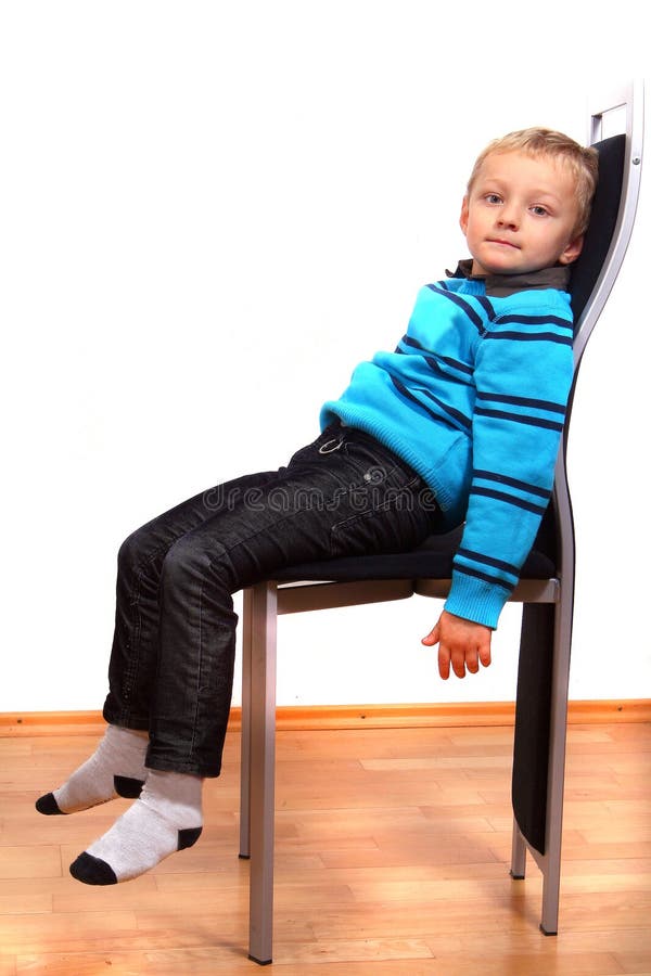 Young Boy on Chair stock photo. Image of child, education - 7239518