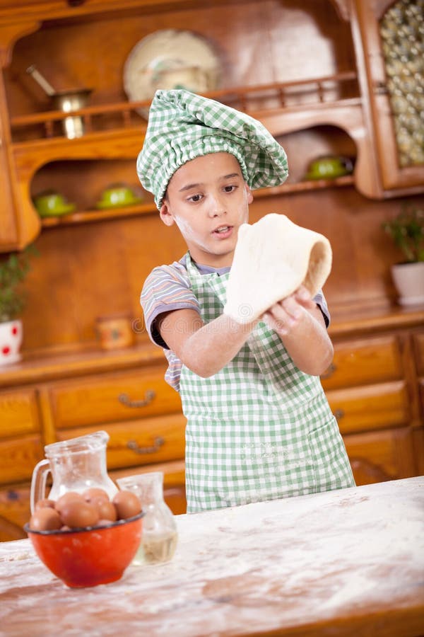Young Boy Chef Prepares Pizza Dough in Kitchen Stock Image - Image of ...