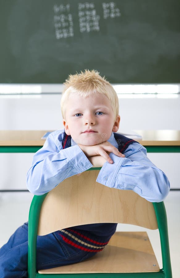 Young boy in the classroom stock image. Image of caucasian - 6435975