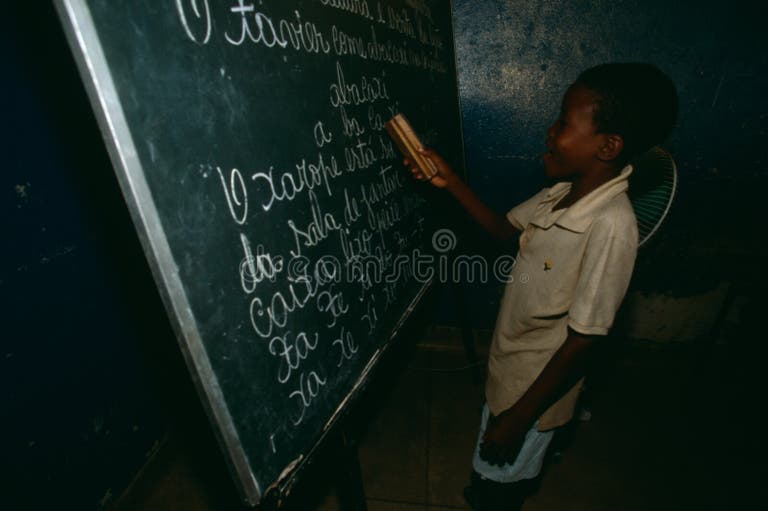 A Young Boy in a Classroom in Rwanda. Editorial Photography - Image of ...