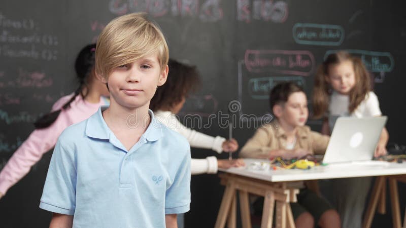 Girl Programming or Coding System while African Boy Fixing Model ...