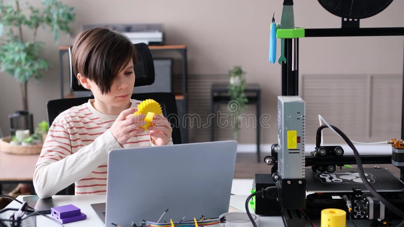 Young Boy Control Quality of 3D Printed Gearwheel Stock Video - Video ...