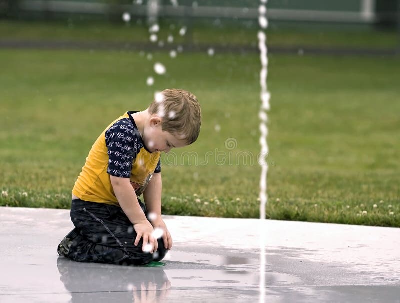 Young Boy Cooling Off stock photo. Image of youth, outdoor - 2851880