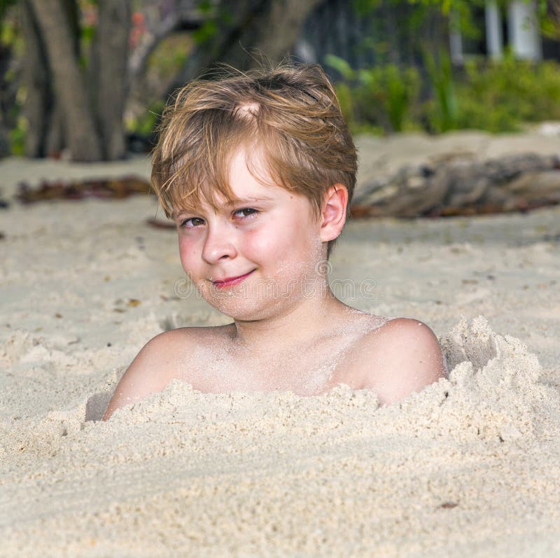 Young Boy Covered by Fine Sand Stock Image - Image of samet, people ...