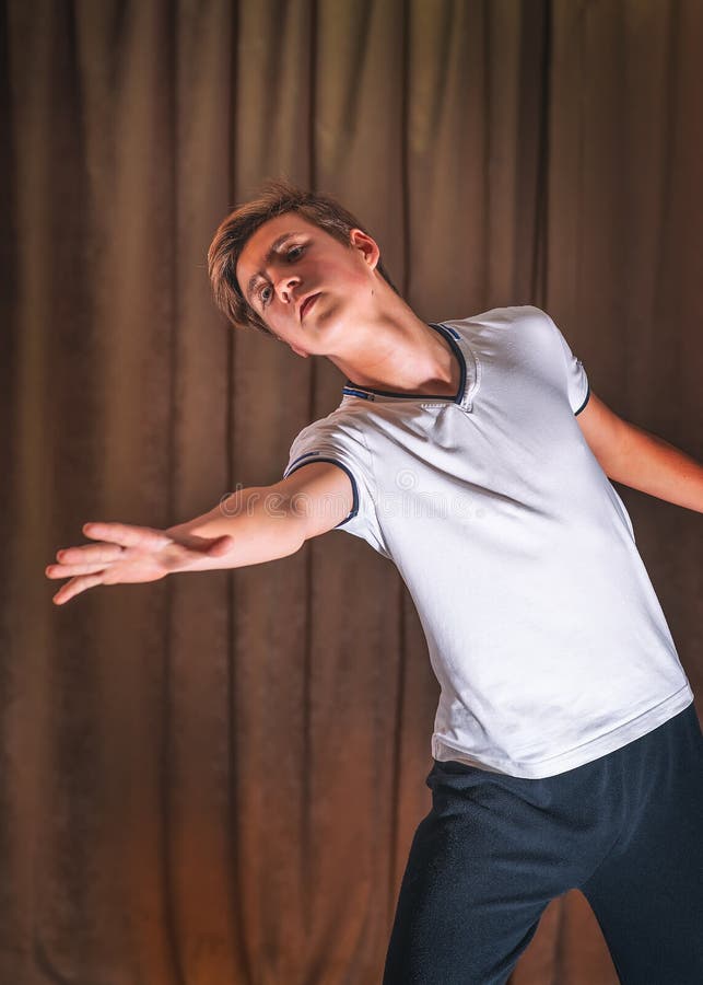 Young Dancer Guy Rehearsing on Stage, Dance Elements Stock Image ...