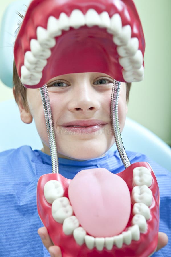 Young boy at the dentist stock image. Image of examine - 43893107