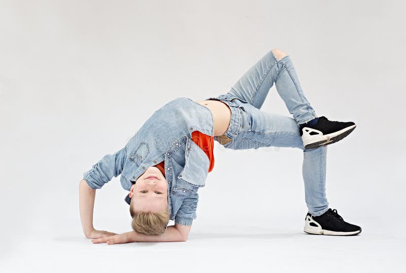 A Boy in an Unusual Breakdance Pose, Dance and Gymnastic Position Stock ...
